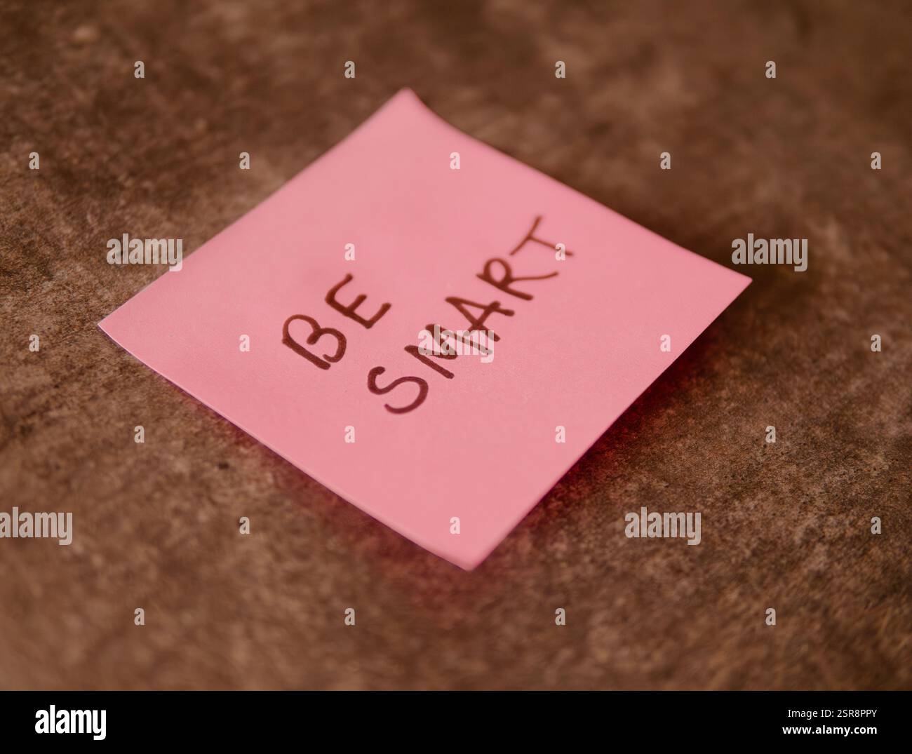pink note shows the motivational phrase encouraging smart choices Stock ...