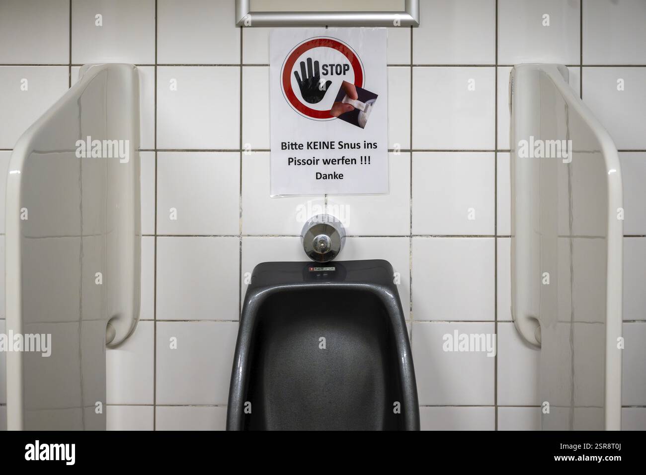 Pissoir Stop Glue Snus Stock Photo - Alamy