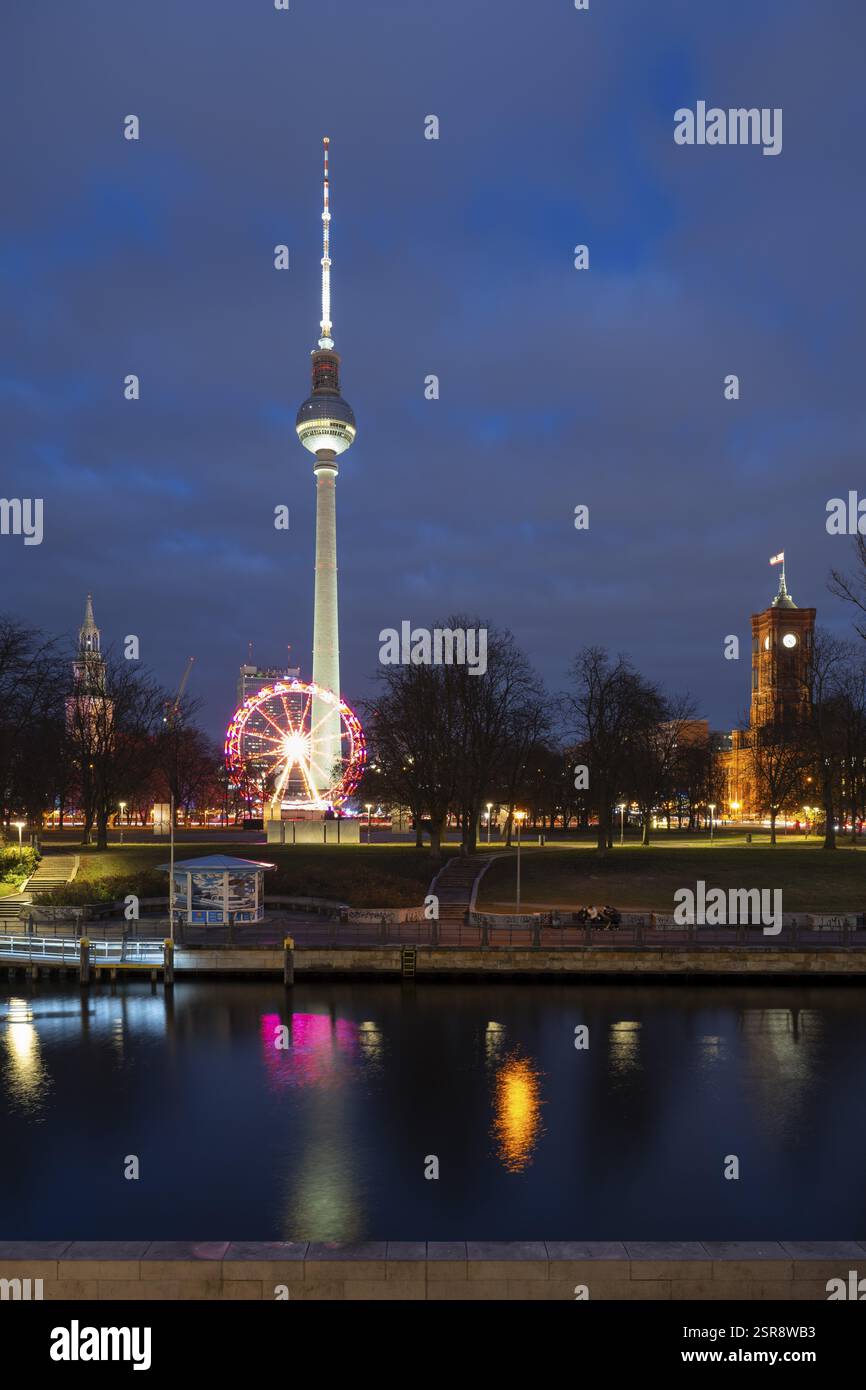 View over the Spree to the city centre park, Ferris wheel in front of ...