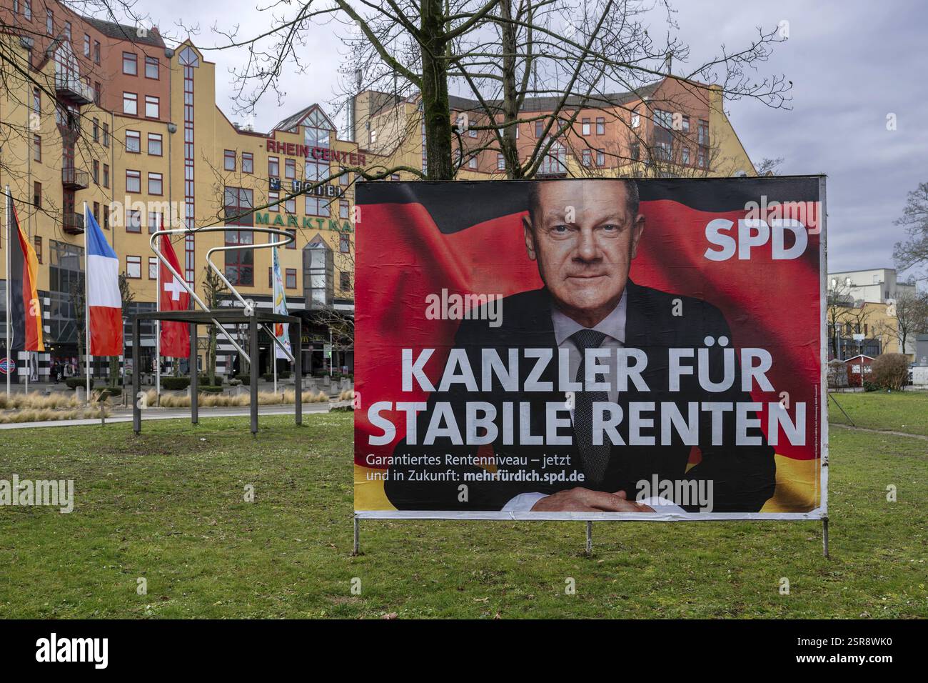 Advertising poster Federal Chancellor Olaf Scholz, SPD, flags border ...