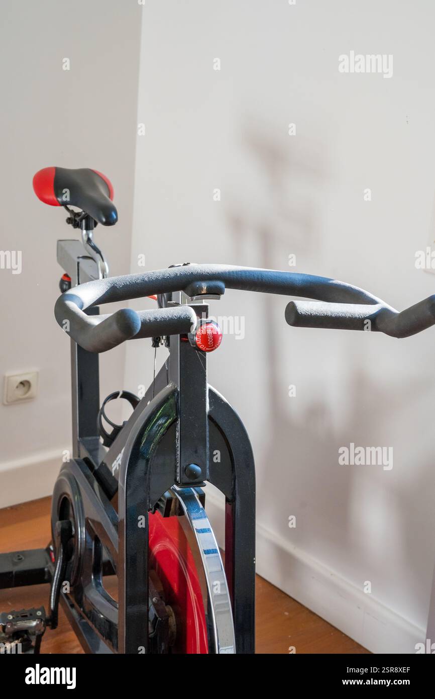 Indoor cycling bike ready for an energetic workout session at home ...
