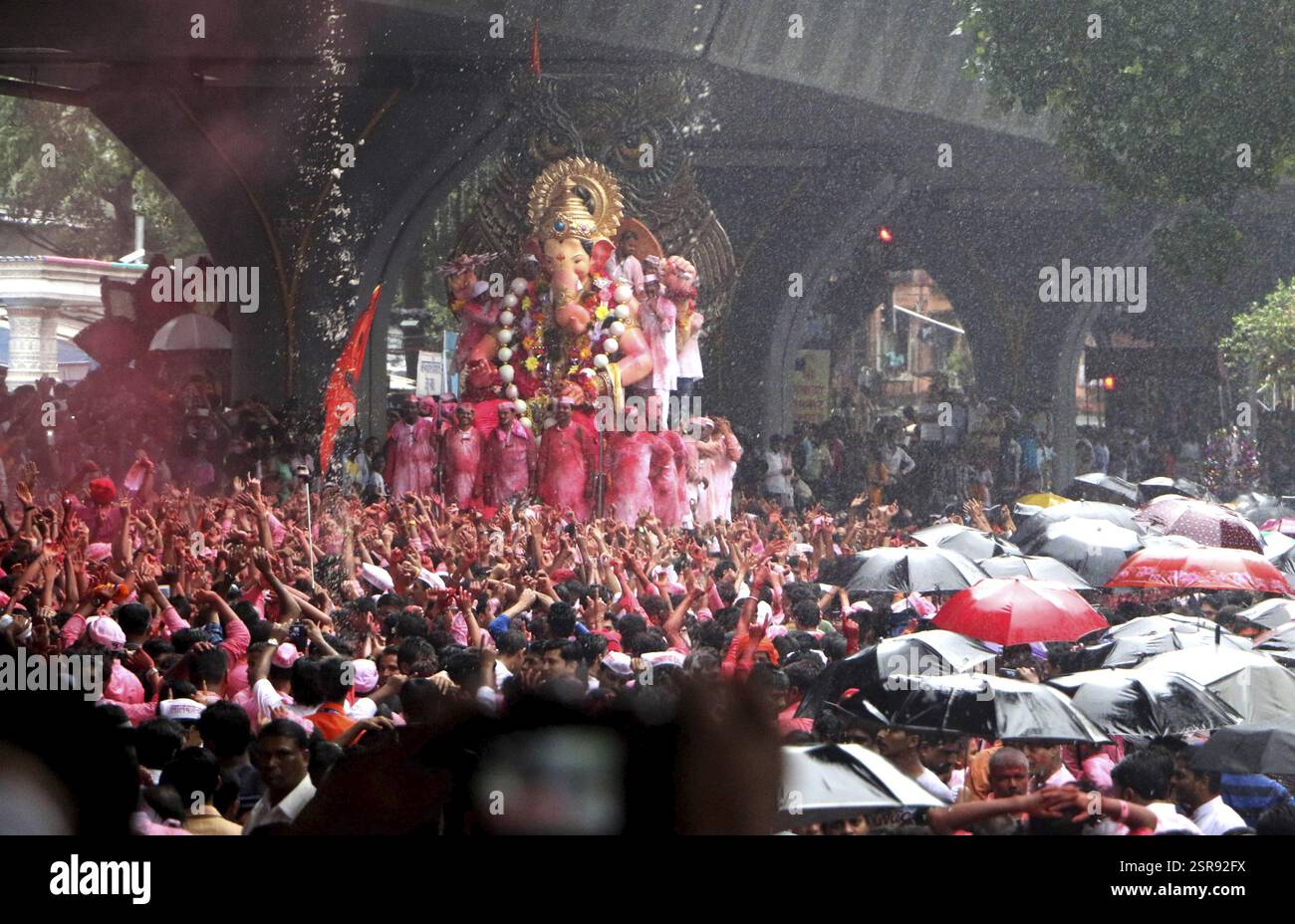 A gigantic idol of Hindu elephant-headed god Ganesh, being led to the ...