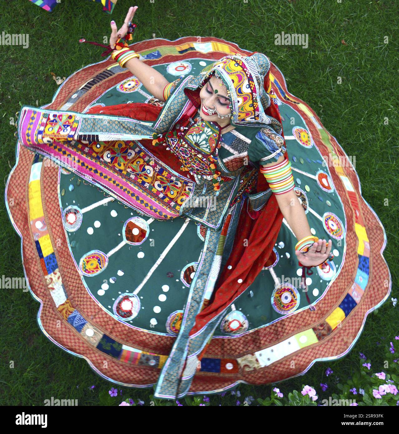 Indian girls practice the Garba dance steps in preparation for the ...