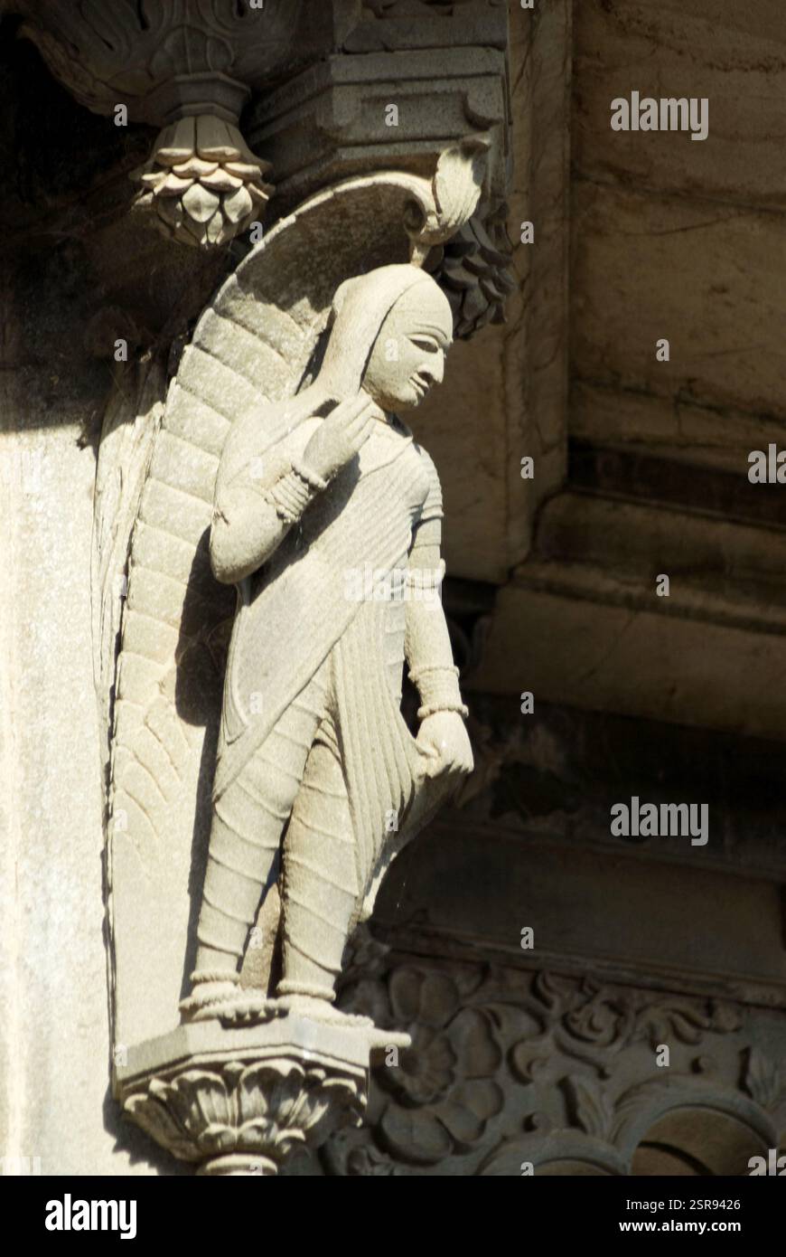 A maharashtrian woman servant carved in stone on the wall of chhatri at ...