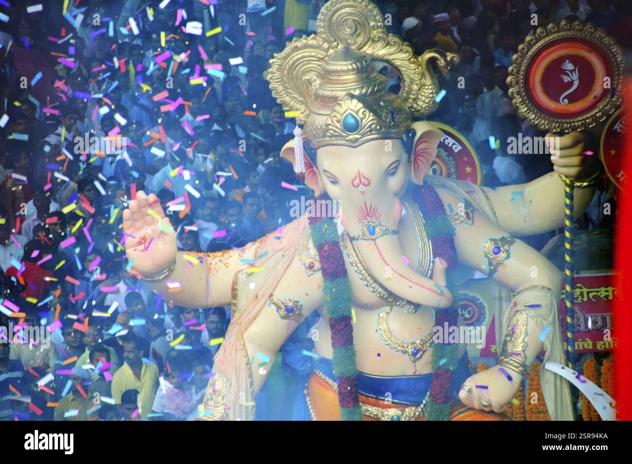 A gigantic idol of Hindu elephant-headed god Ganesh, being led to the ...