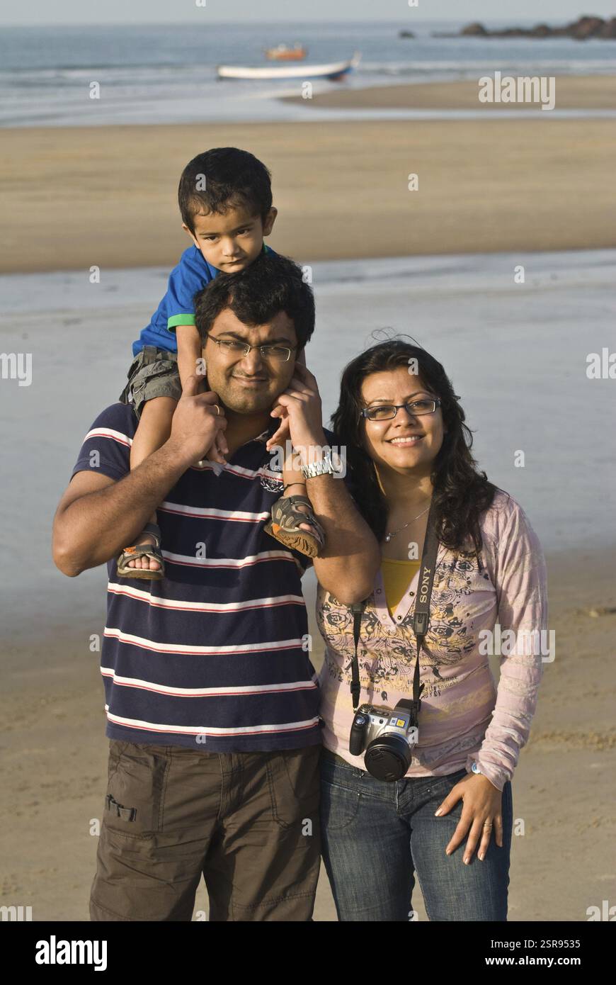 Family enjoying on Nivati beach Tal Sindhudurg Maharashtra India Asia ...