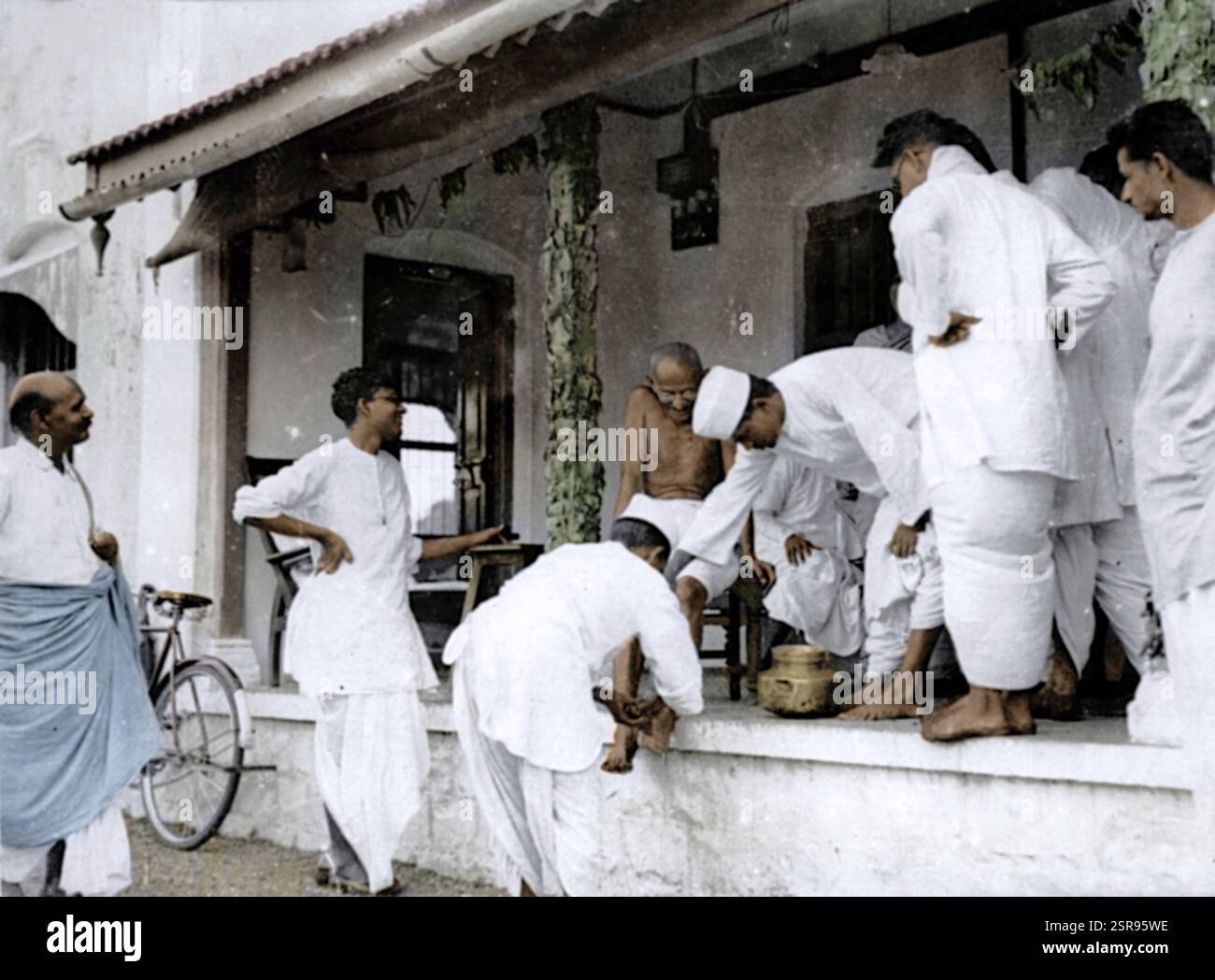 Mahatma Gandhi getting thorn extracted from foot by barber, Wardha ...