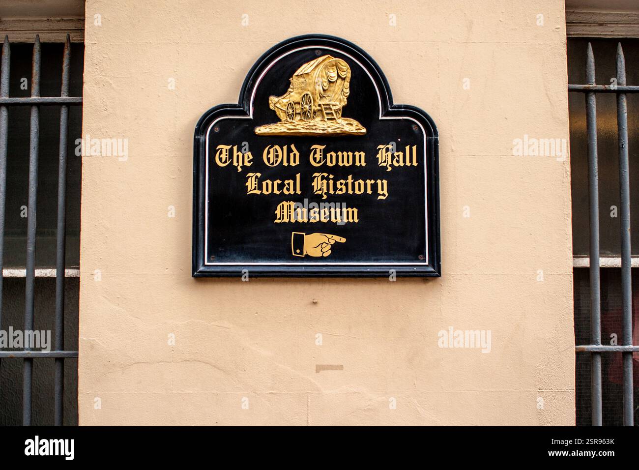 Sign and direction arrow to the Old Town Hall Local History Museum in ...
