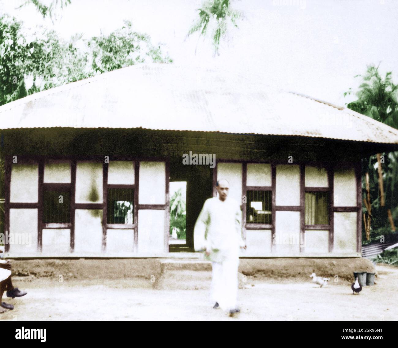 Prof Nirmal Kumar Bose leaving hut, Srirampur, East Bengal, Bangladesh ...