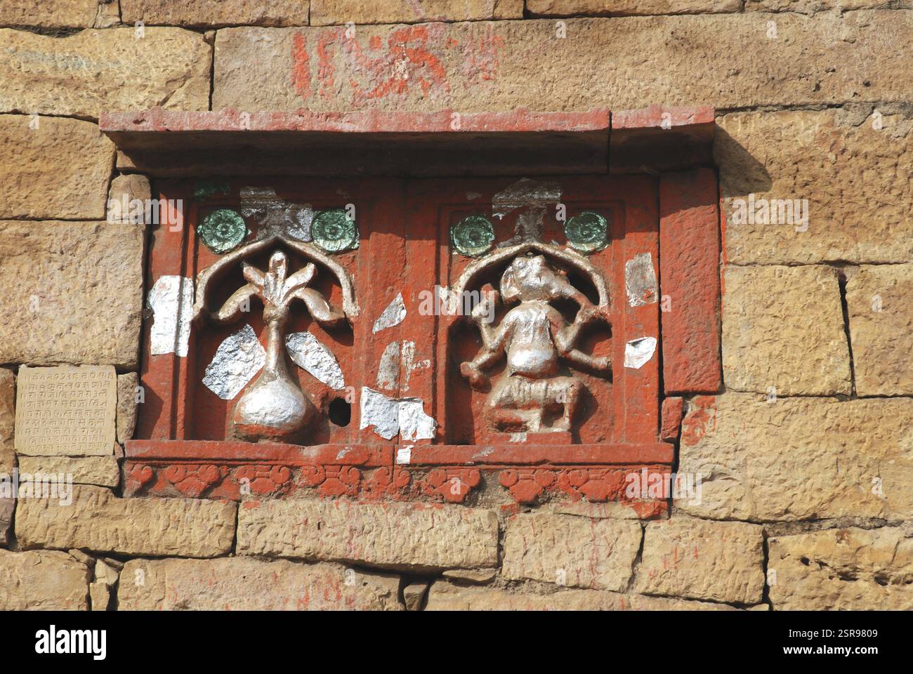 Symbol of Kalash and idol of ganesha on wall of Jaisalmer fort ...