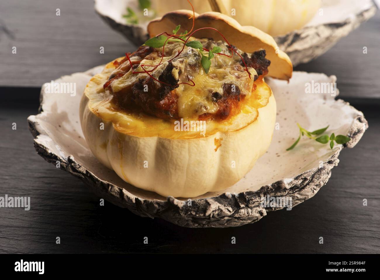 Delicious autumn recipe for stuffed pumpkin Stock Photo - Alamy