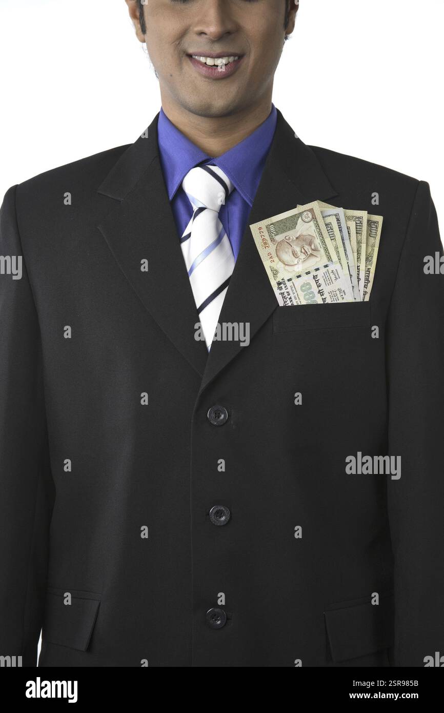 Executive without face keep Rs.500 notes in upper pocket of coat MR ...