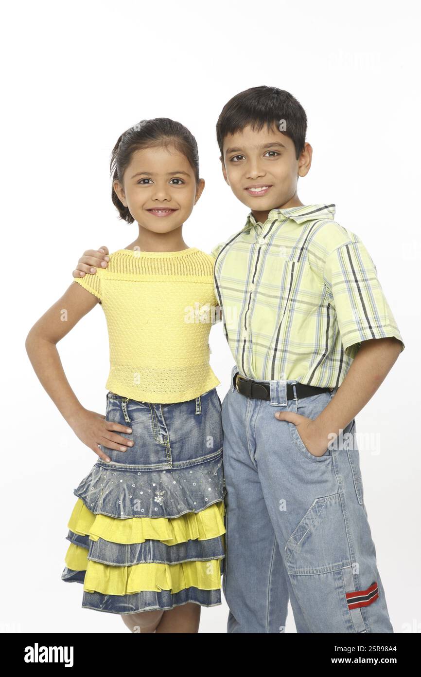 Brother and sister standing close to each other and smiling MR#703N ...