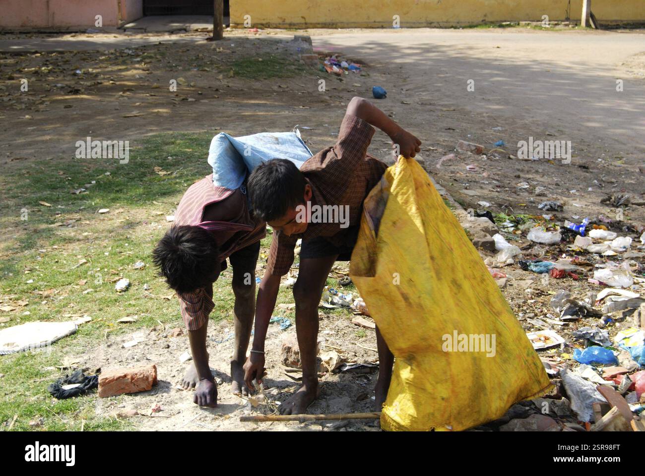Kids around dustbin, Varanasi, Uttar Pradesh, India, Asia Stock Photo ...