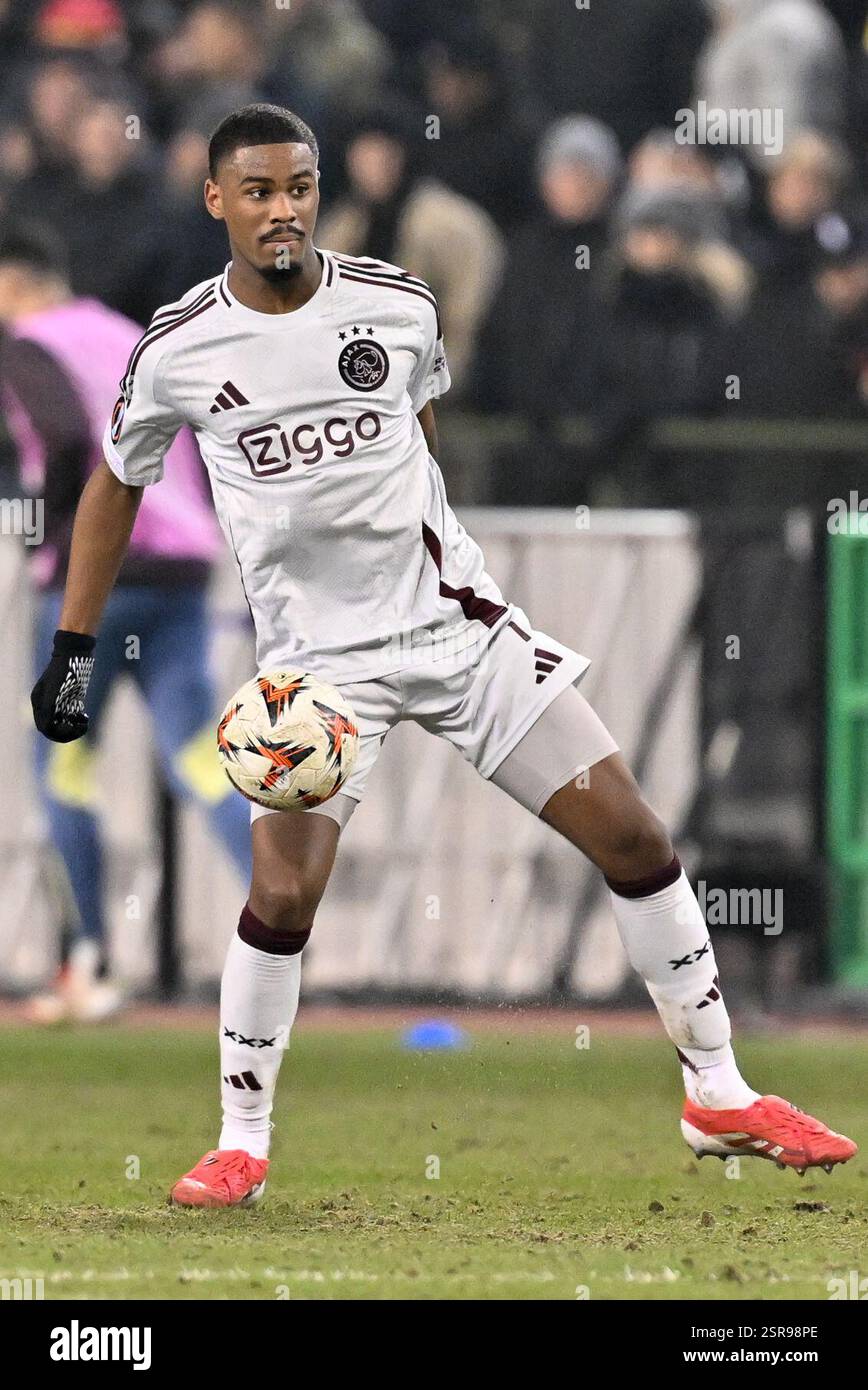 Brussel, Belgium. 13th Feb, 2025. Jorrel Hato (4) of Ajax pictured ...