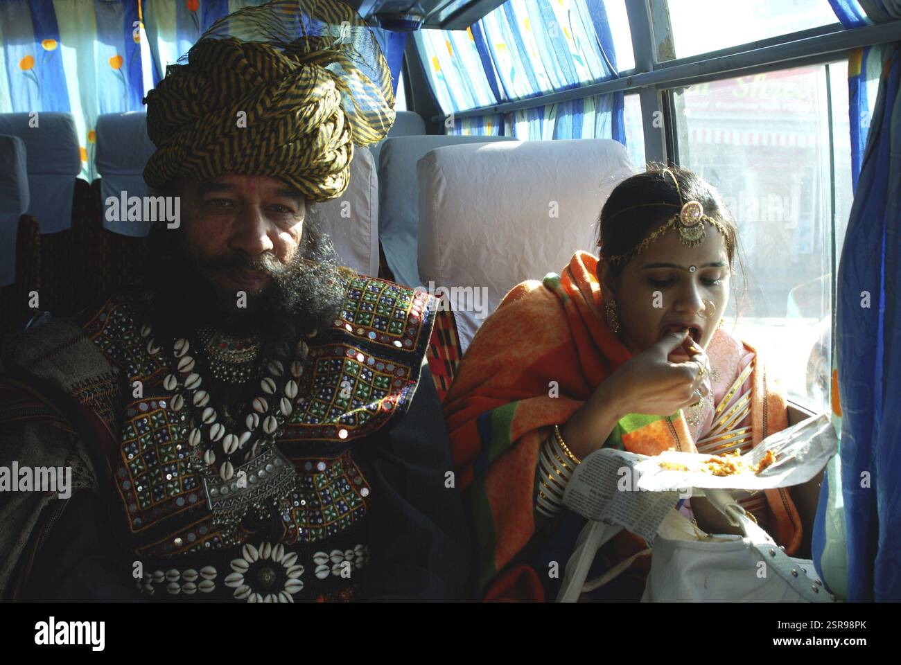 Rajasthani man with woman sitting in bus, Rajasthan, India MR# 704C ...