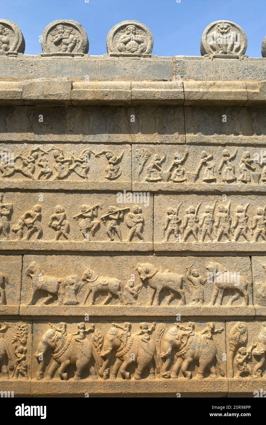 Outer wall of Ramachandra temple embellished with carvings in Hampi ...