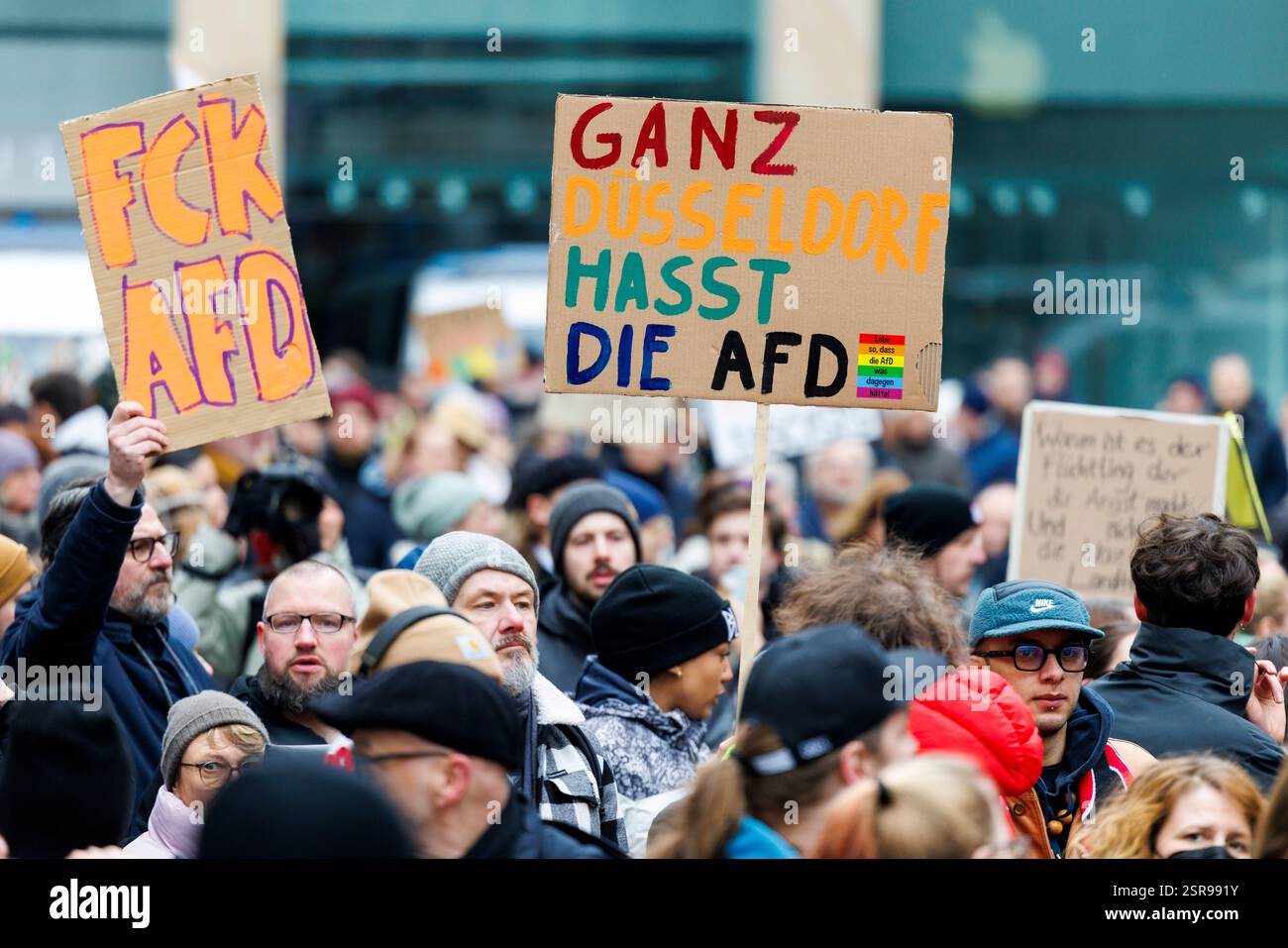 15 February 2025, North Rhine-Westphalia, Duesseldorf: Demonstrators ...