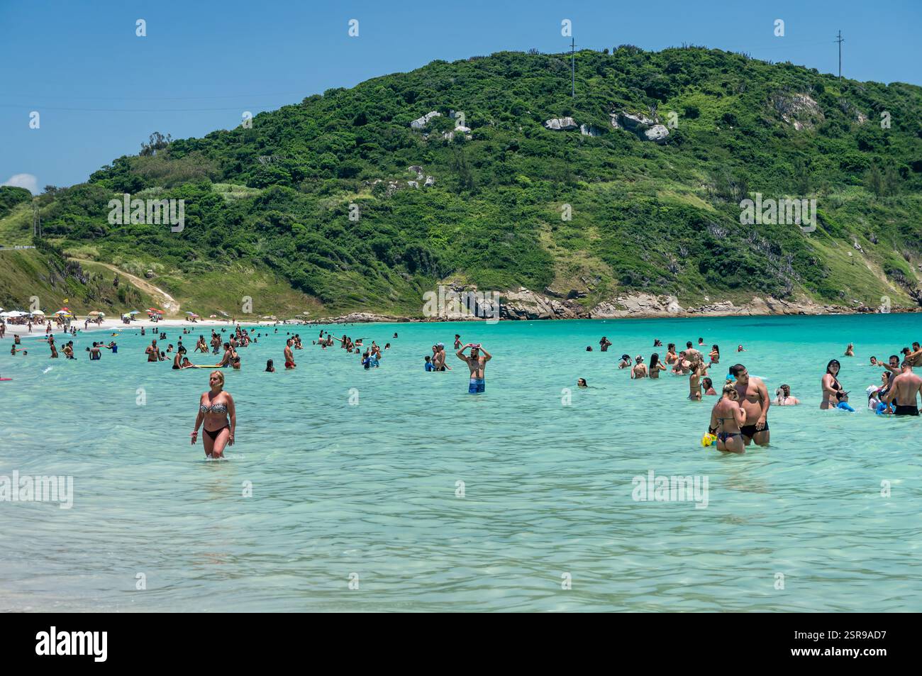 Crowds of tourists enjoying the turquoise Atlantic Ocean waters at ...