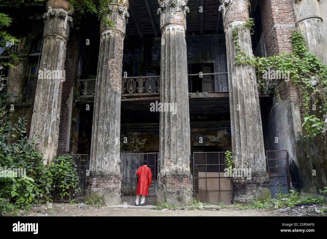 Man standing below old palace, Kolkata, West Bengal, India, Asia Stock ...