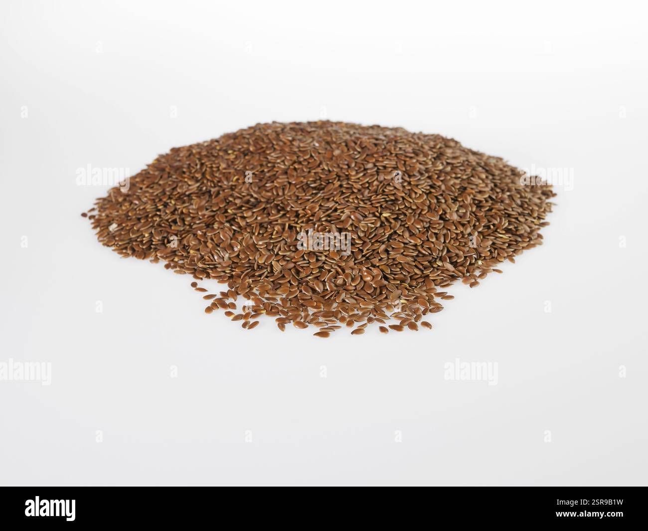 Flaxseed on white background Stock Photo - Alamy