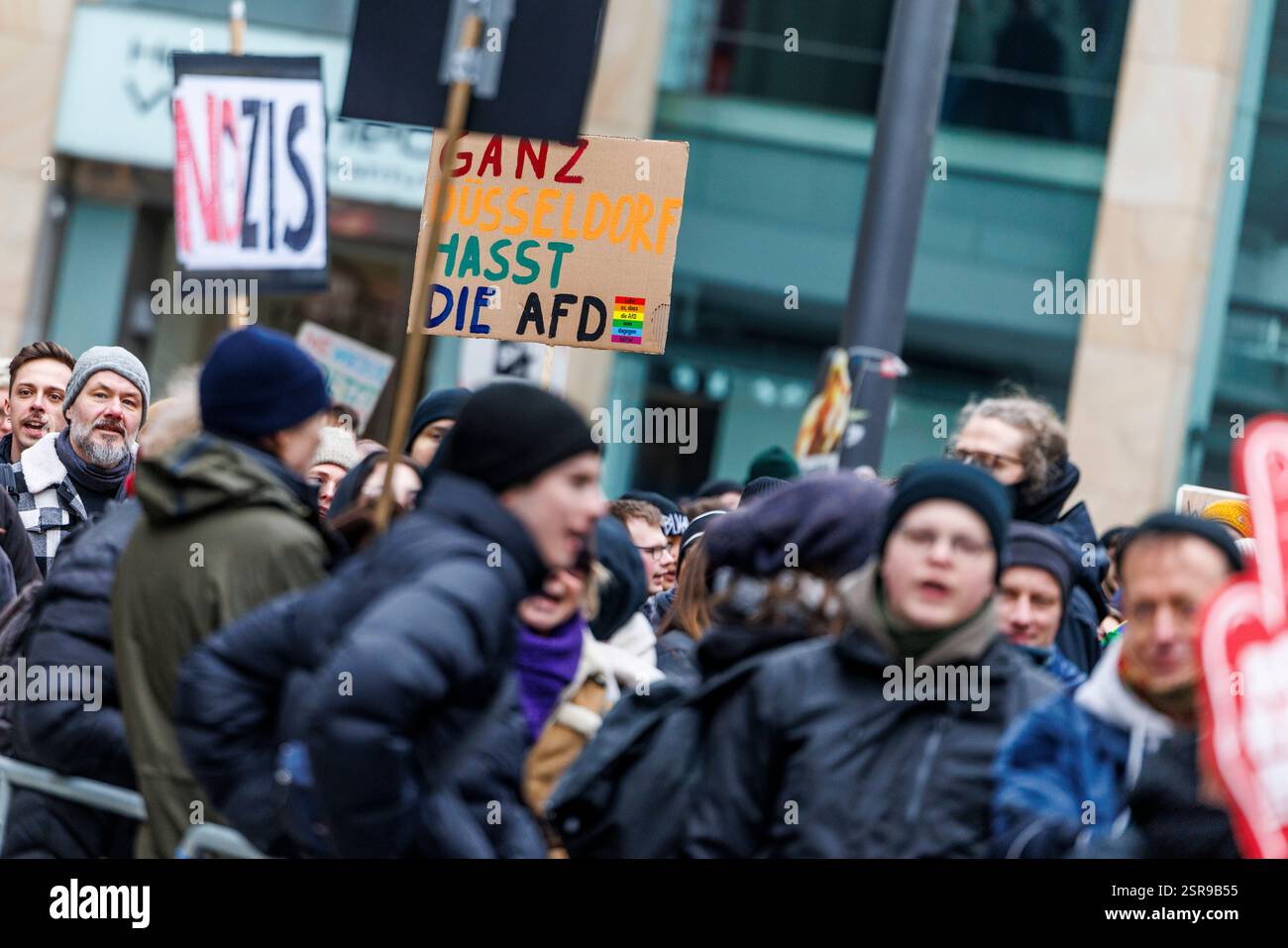 15 February 2025, North Rhine-Westphalia, Duesseldorf: Demonstrators ...