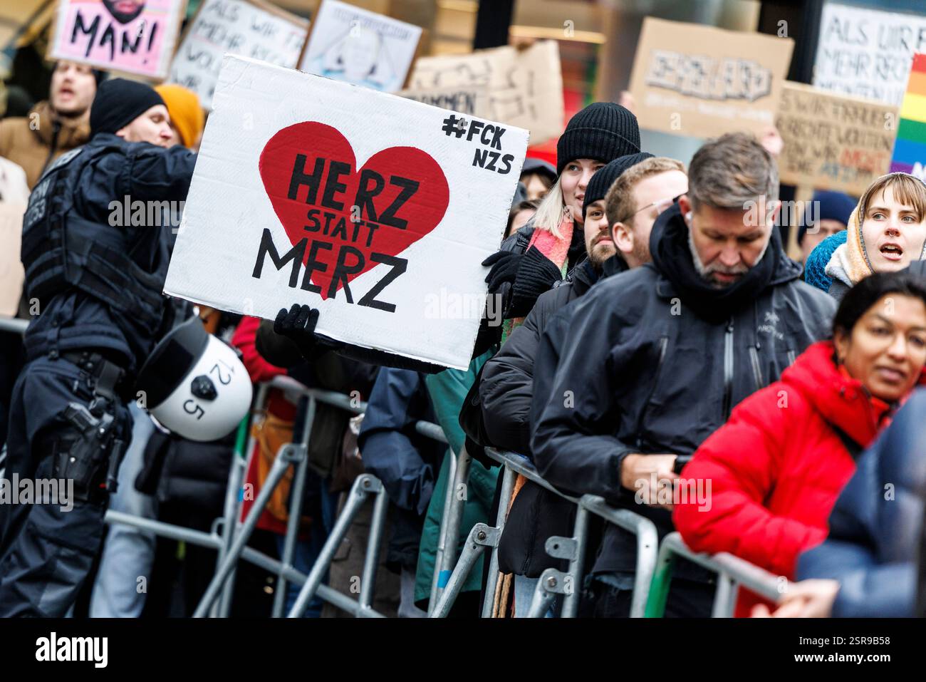 15 February 2025, North Rhine-Westphalia, Duesseldorf: Demonstrators ...