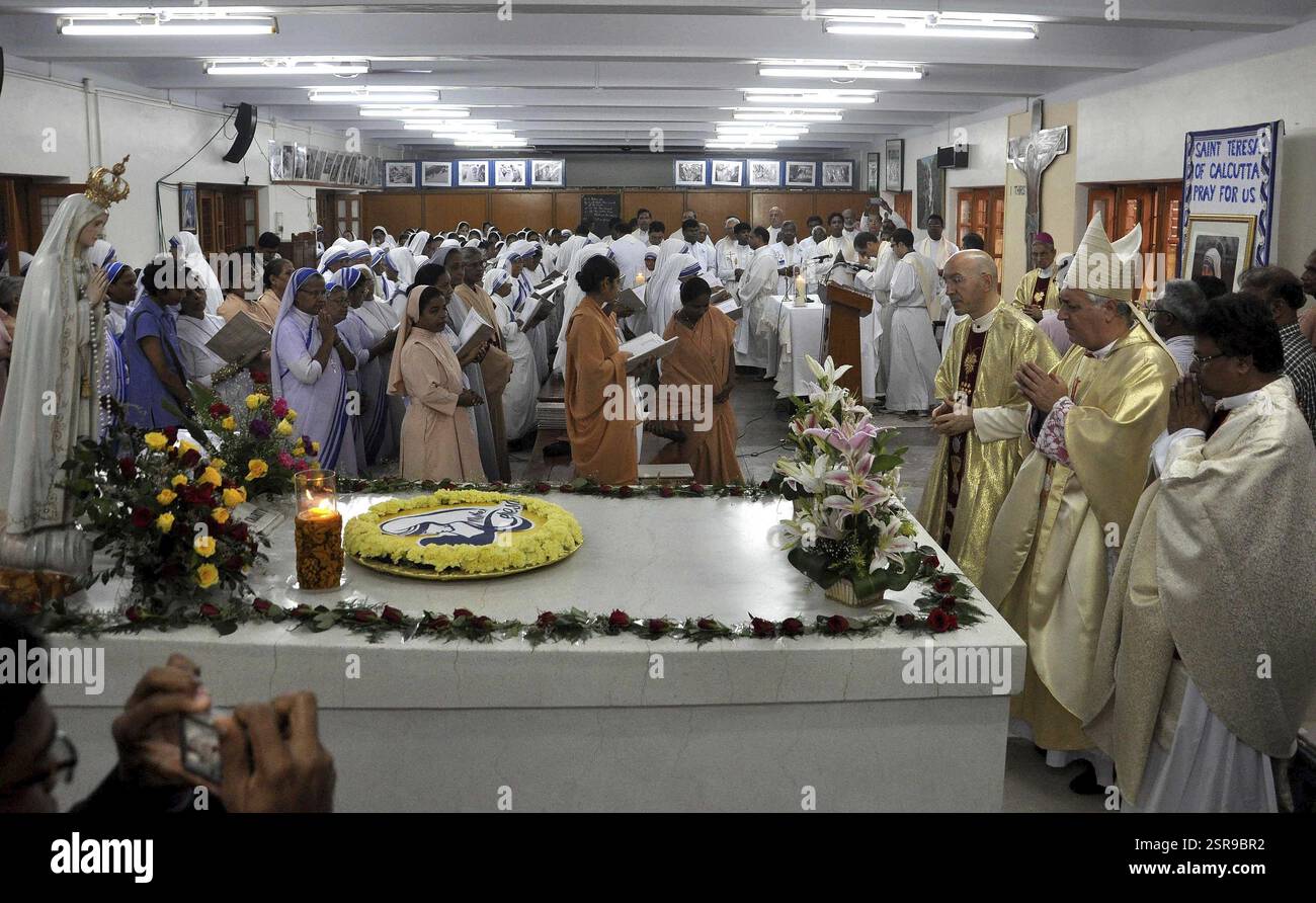 Roman Catholic priests Missionaries Charity devotees attend service ...