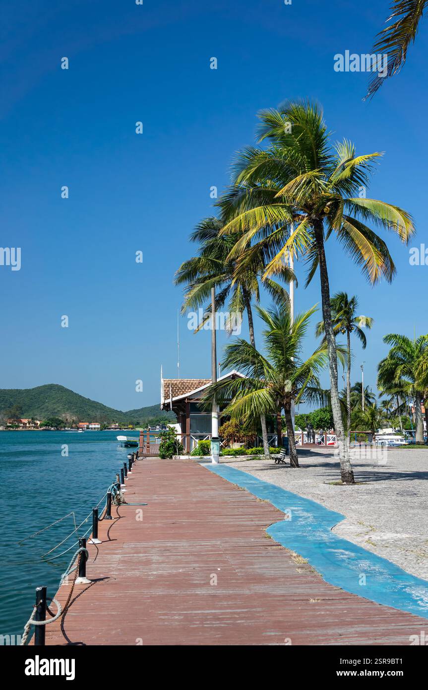 Scenic east view of wooden pier at Itajuru Canal along Pescadores ...