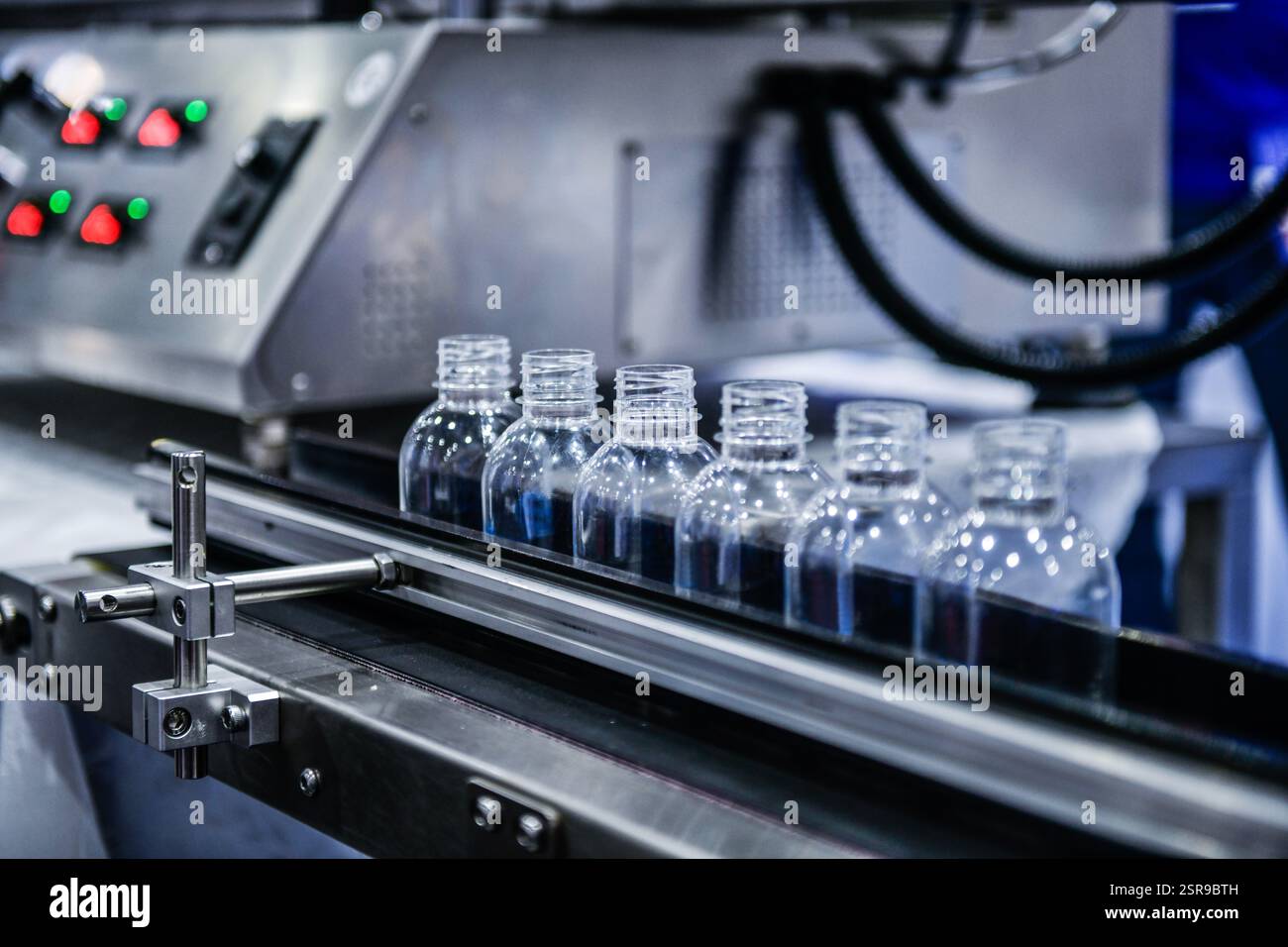 Clear plastic Bottles transfer on Automated conveyor systems industrial ...