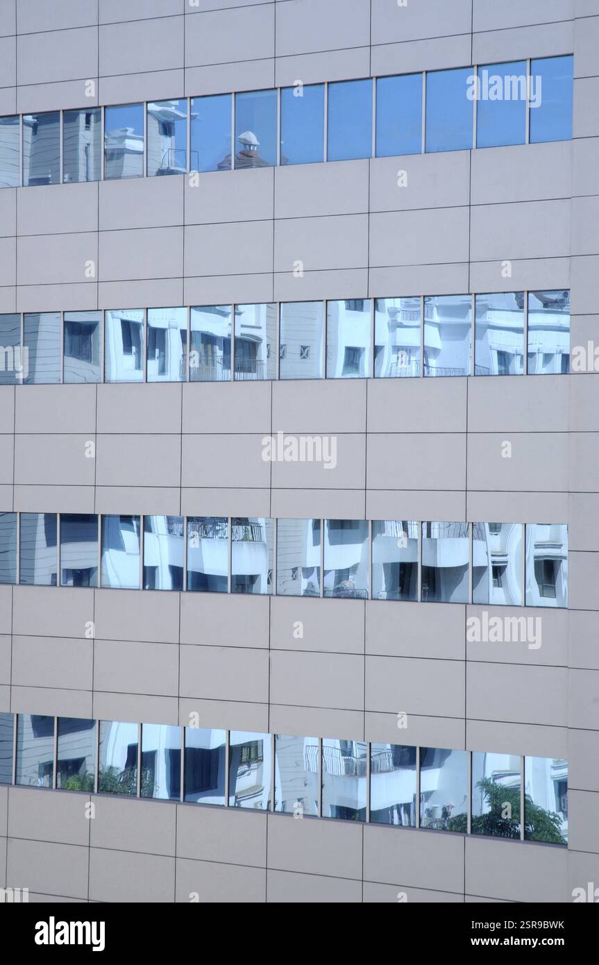 Reflection of buildings on glass windows of IT building, Pune ...