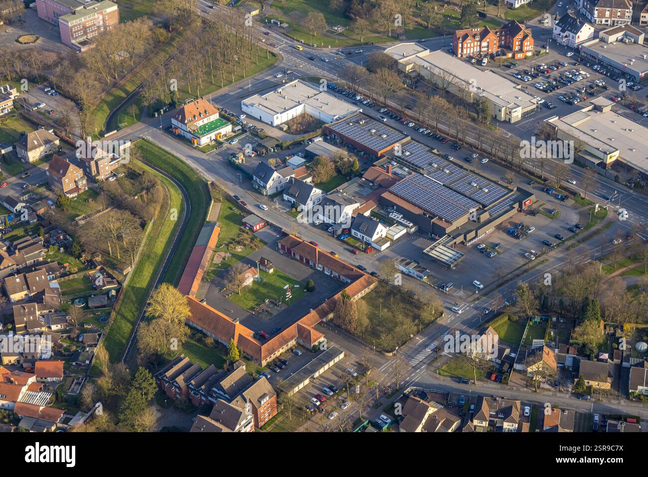 Aerial view, shopping center with supermarket Rewe, Edeka, Aldi and DM ...