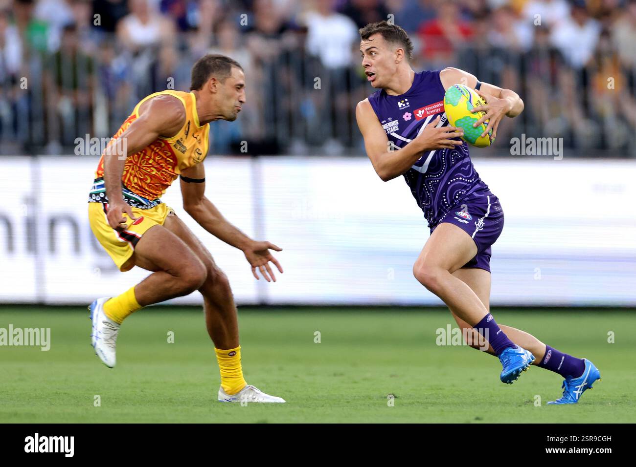 Perth, Australia. 15th Feb, 2025. Cooper Simpson of the Dockers under ...