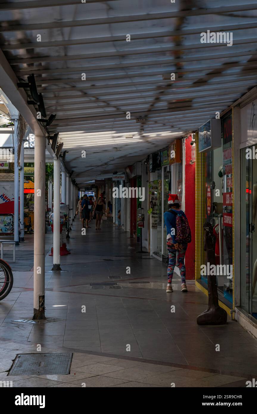 Shaded corridor of Rua dos Biquinis mall in Gamboa district with ...