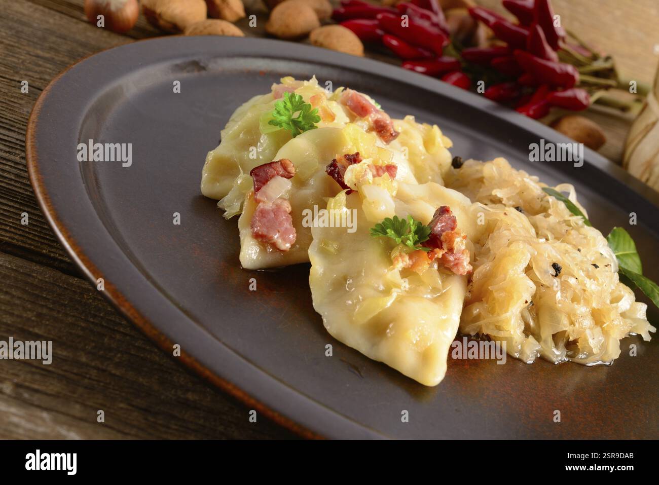 Pierogi.Polish dish pierogi with sauerkraut and mushrooms Stock Photo ...