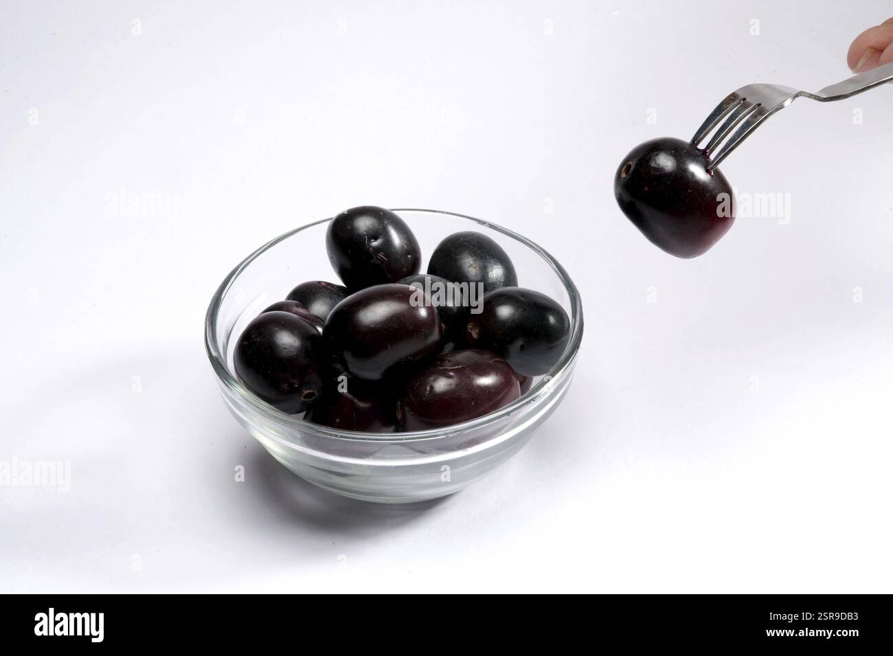 Fruits, java plum syzygium cumini in glass bowl Stock Photo - Alamy