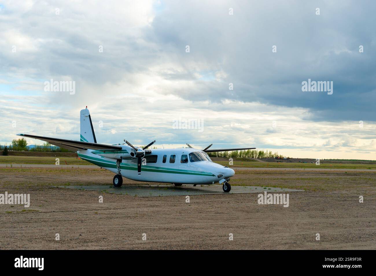 Government contracted twin engine Aero Commander airplane on standby ...