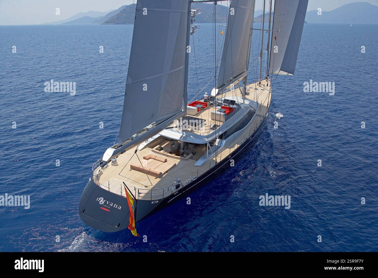 Aerial Stern View of Luxury Sailing Yacht Nirvana Gliding Through Calm ...