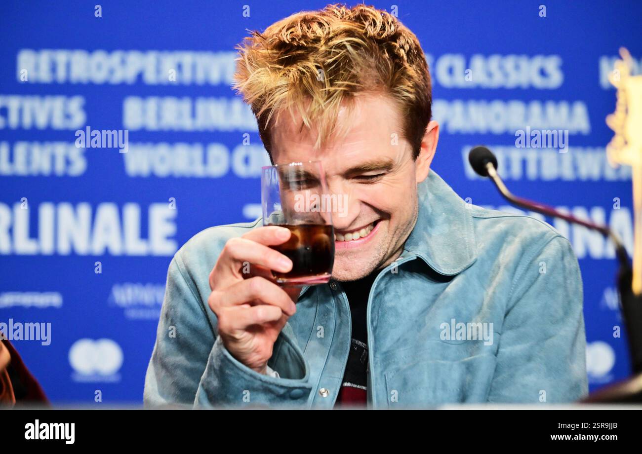Berlin, Germany. 15th Feb, 2025. Robert Pattinson, actor, laughs during ...
