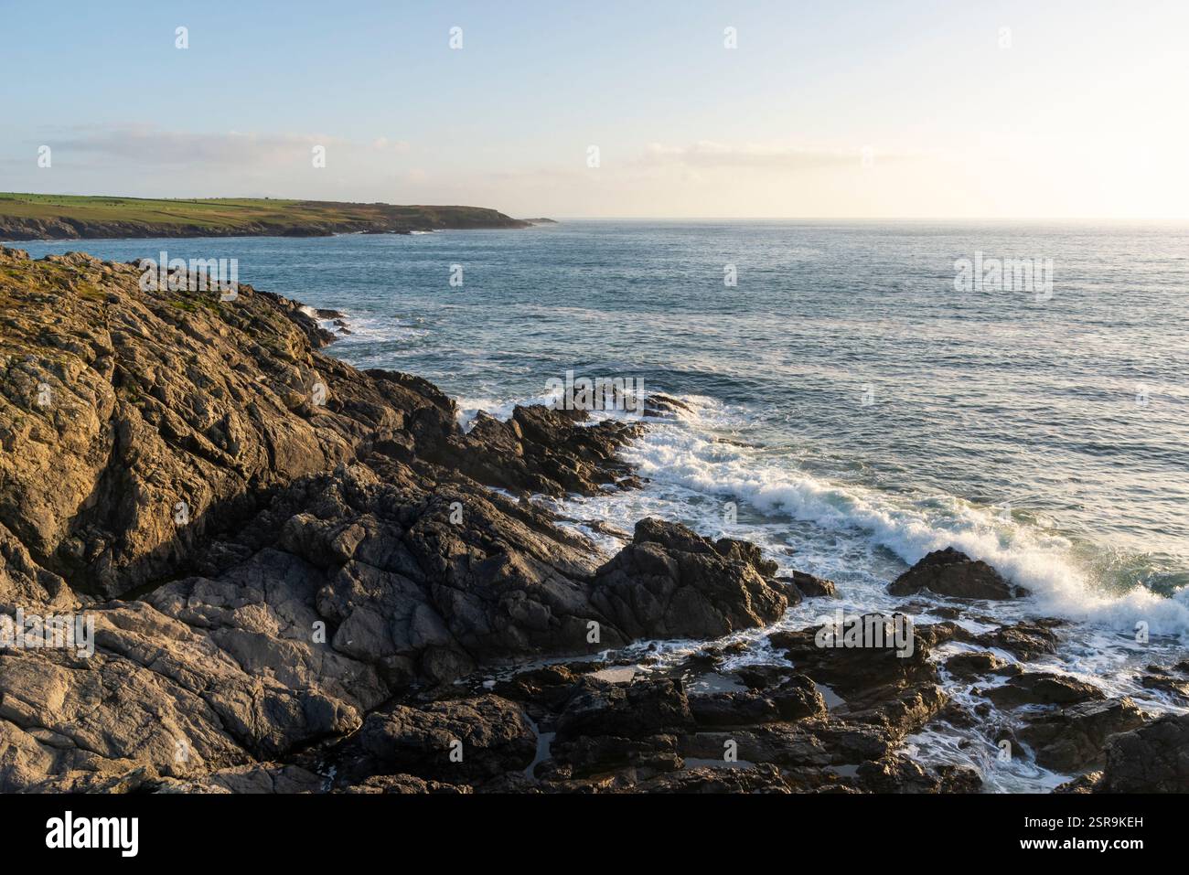 Rugged coastline near Rhosneigr on Anglesey in North Wales Stock Photo ...
