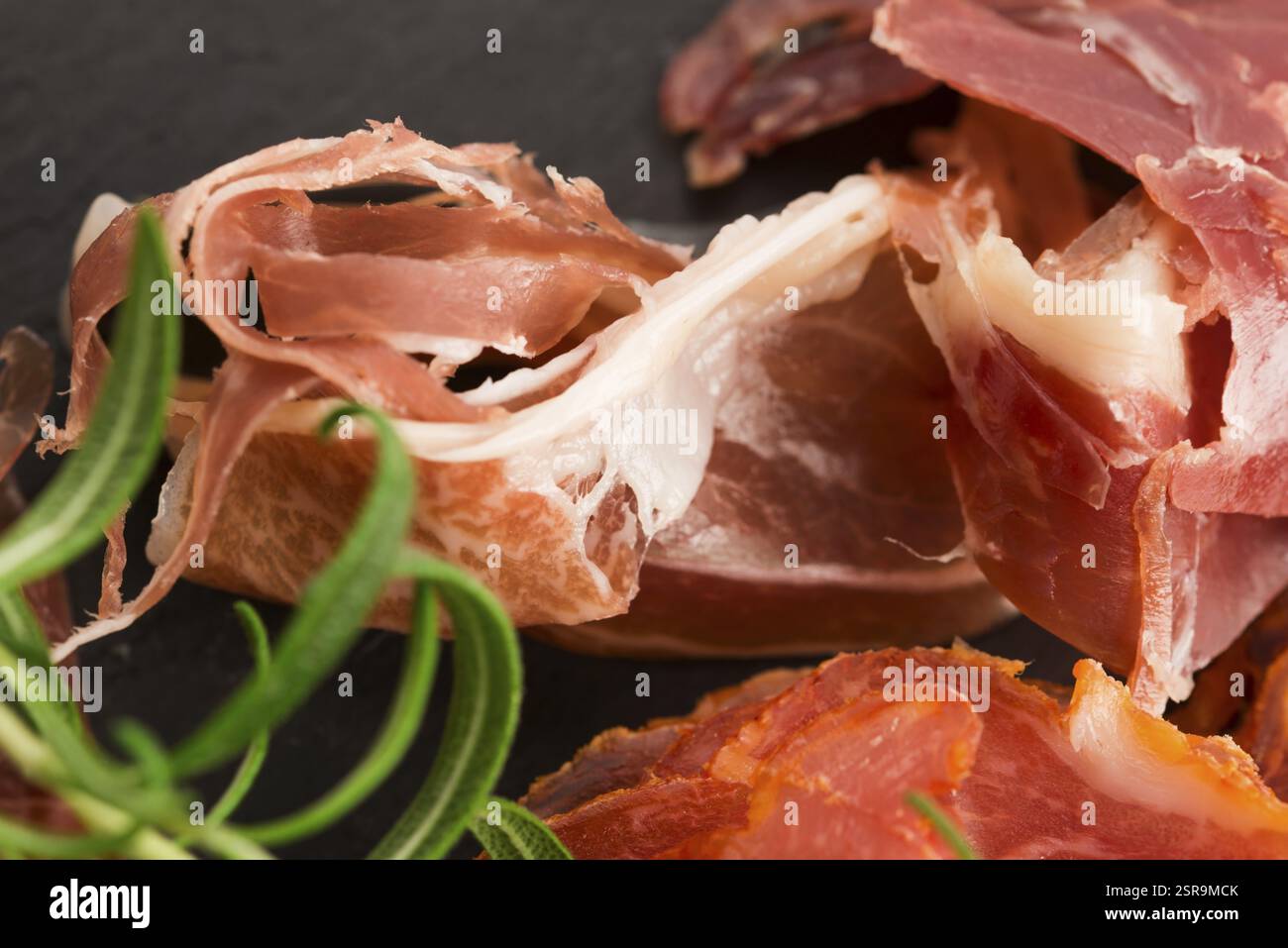 A pile of different spanish embutido, jamon, chorizo and lomo embuchado ...