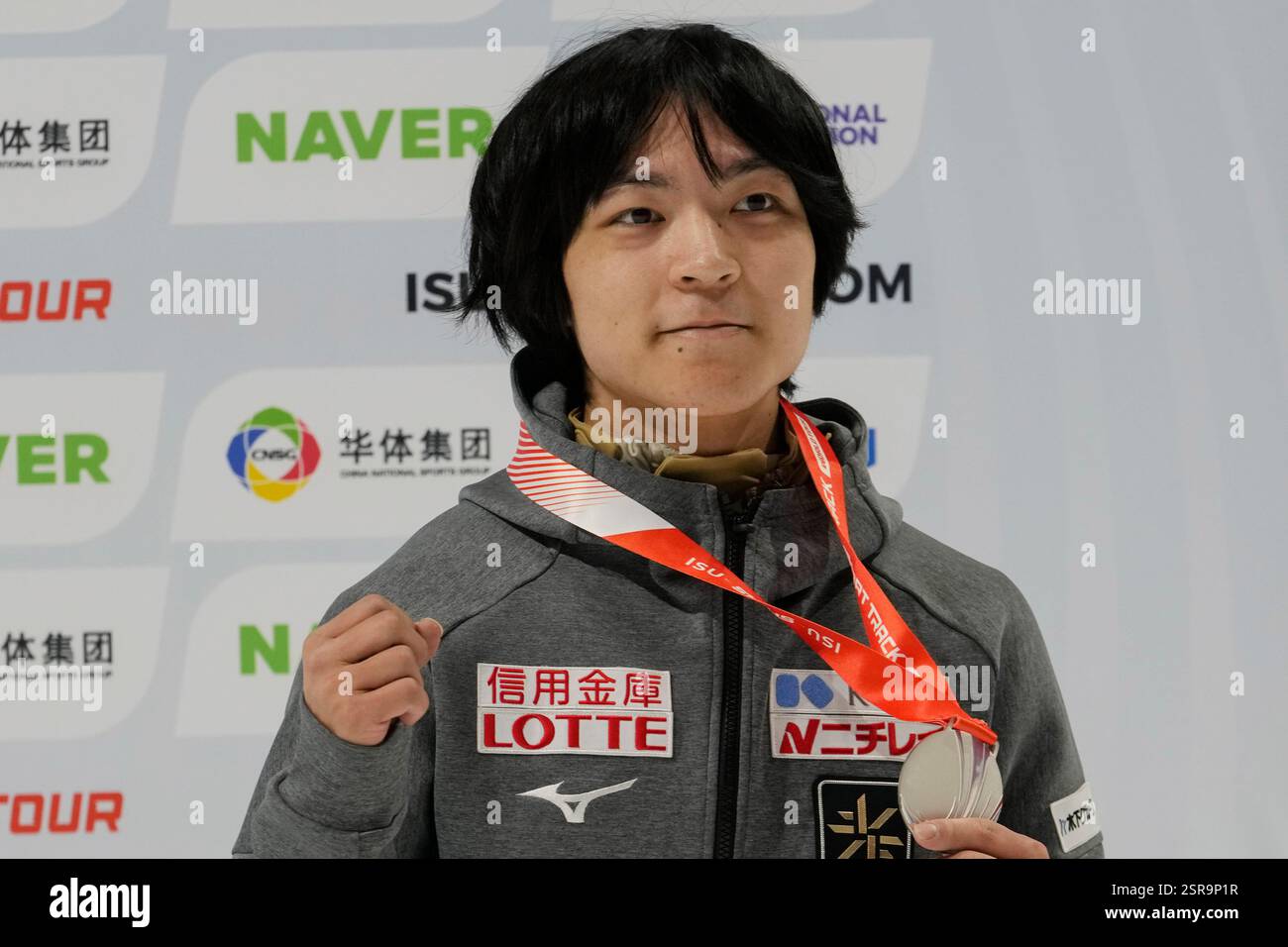 Japan's Kosey Hayashi holds the silver medal after the men's 1500 ...