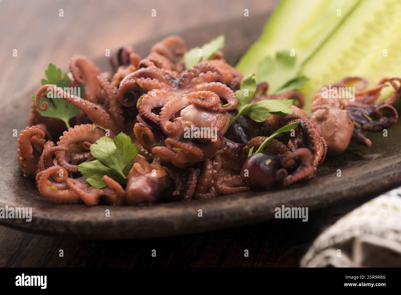 Octopus. Greek, eating Stock Photo - Alamy