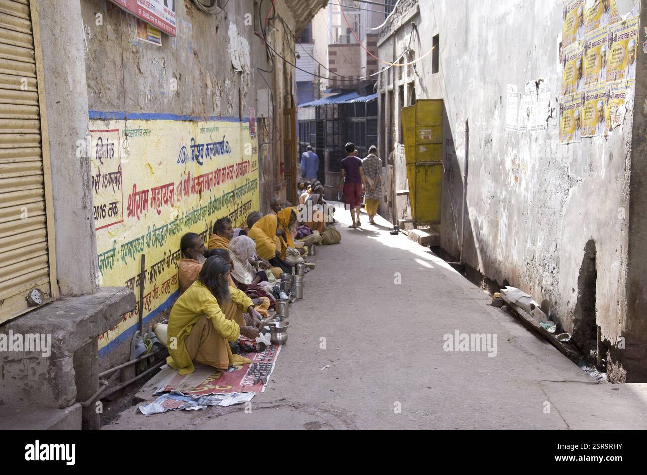 Beggar sitting on road vrindavan uttar pradesh, india, asia Stock Photo ...