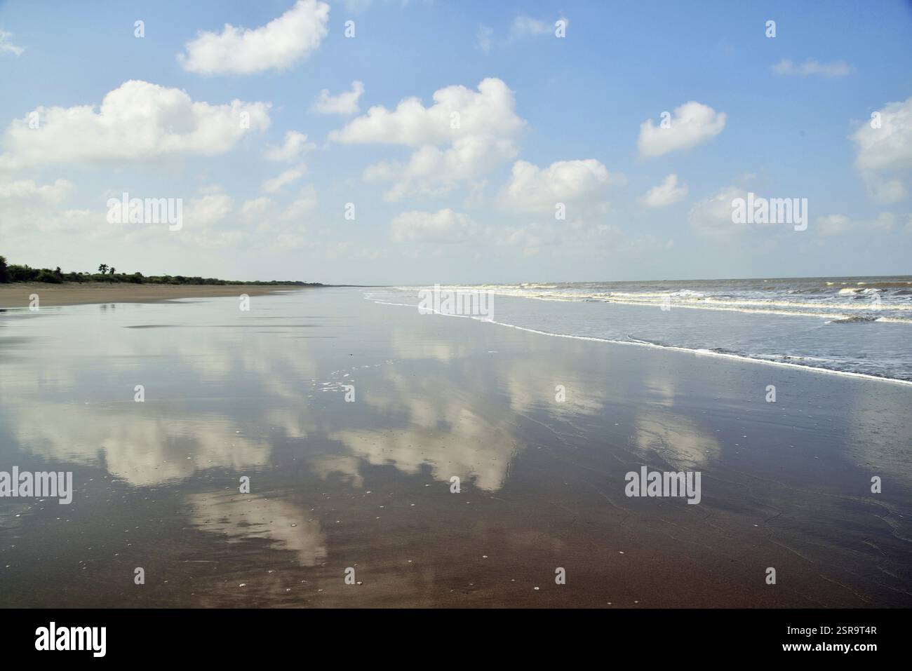 White clouds reflected on Bhagal beach, Gujarat, India, Asia Stock ...