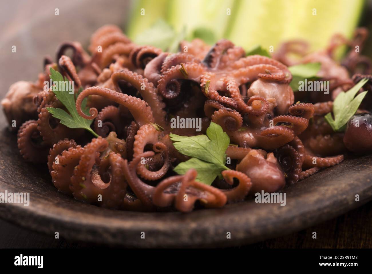 Octopus. Greek, eating Stock Photo - Alamy