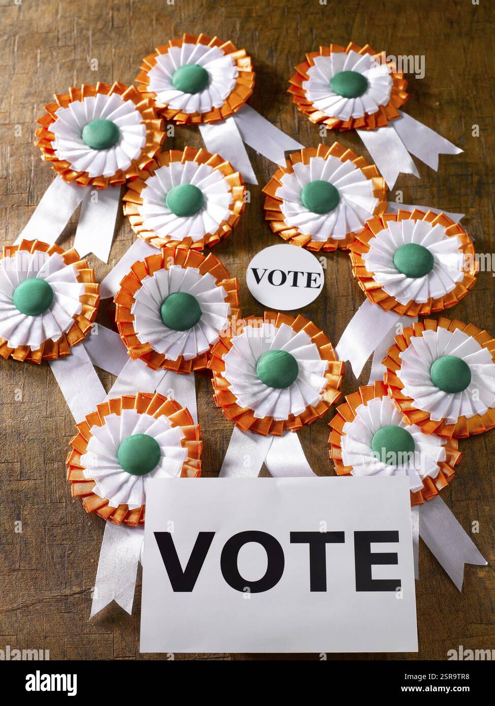 Indian national flag color badge with white board printed vote in ...