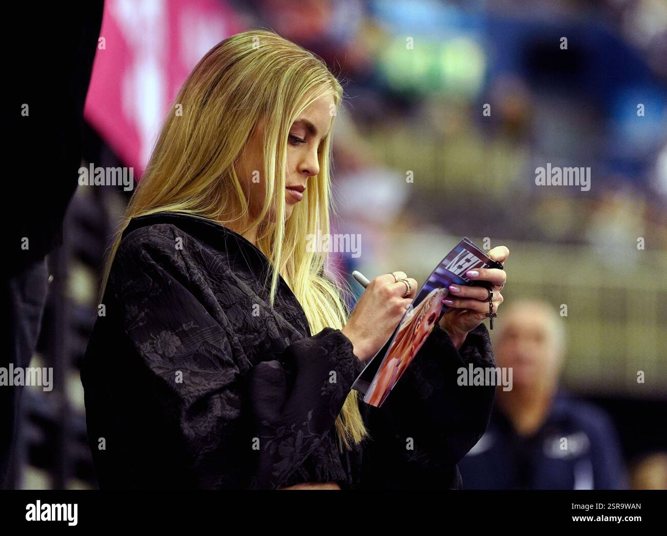 Keely Hodgkinson signs autographs for fans during The Keely Klassic at ...