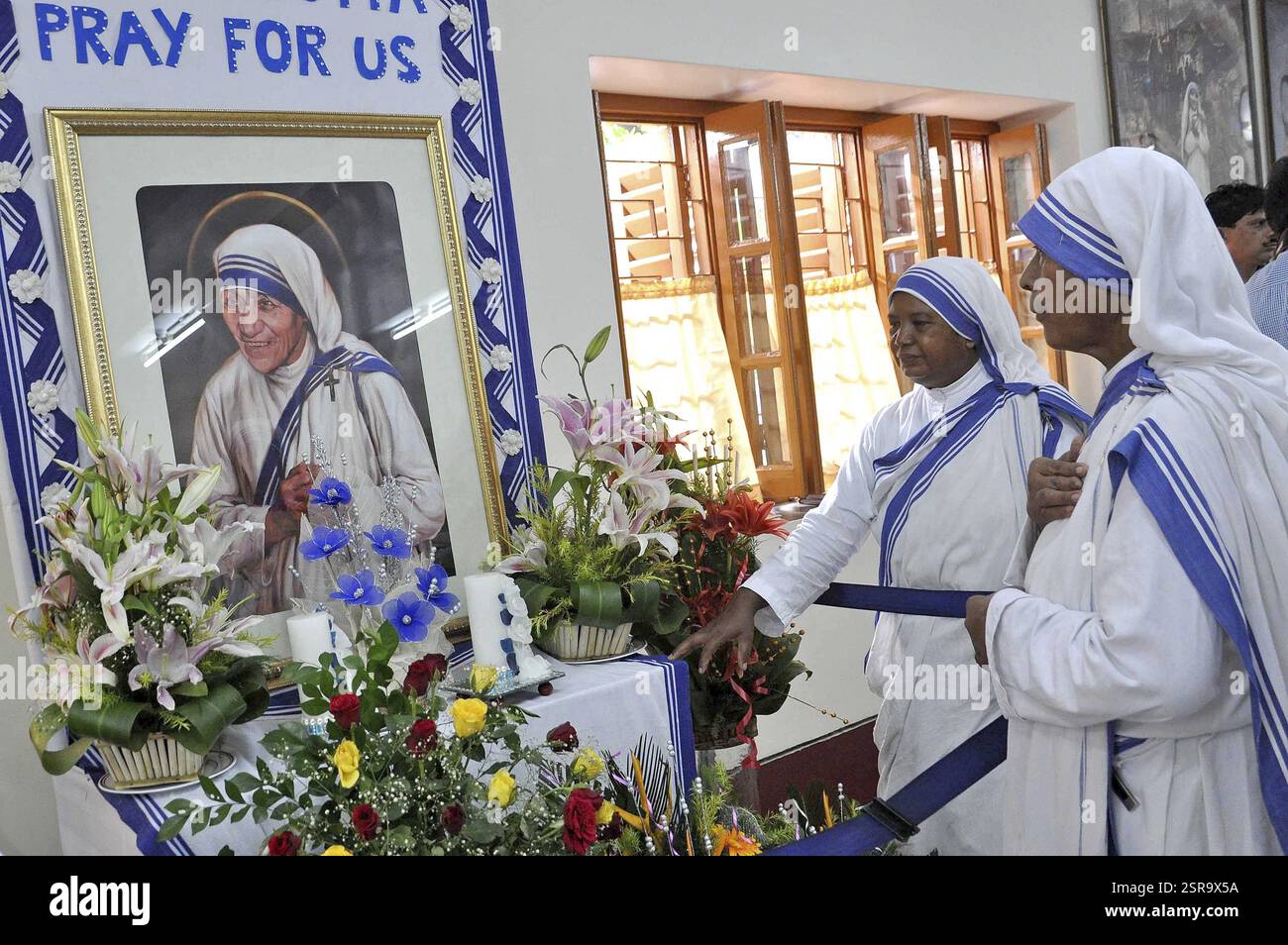 Roman Catholic priests Missionaries Charity devotees attend service ...