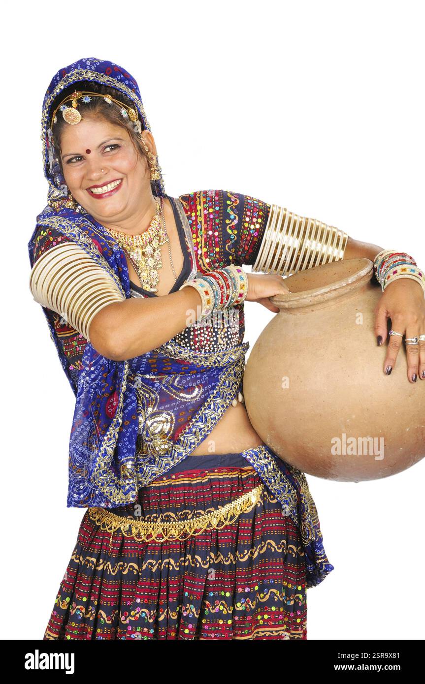 Rajasthani lady carrying earthen pitcher in hands MR#786 Stock Photo ...